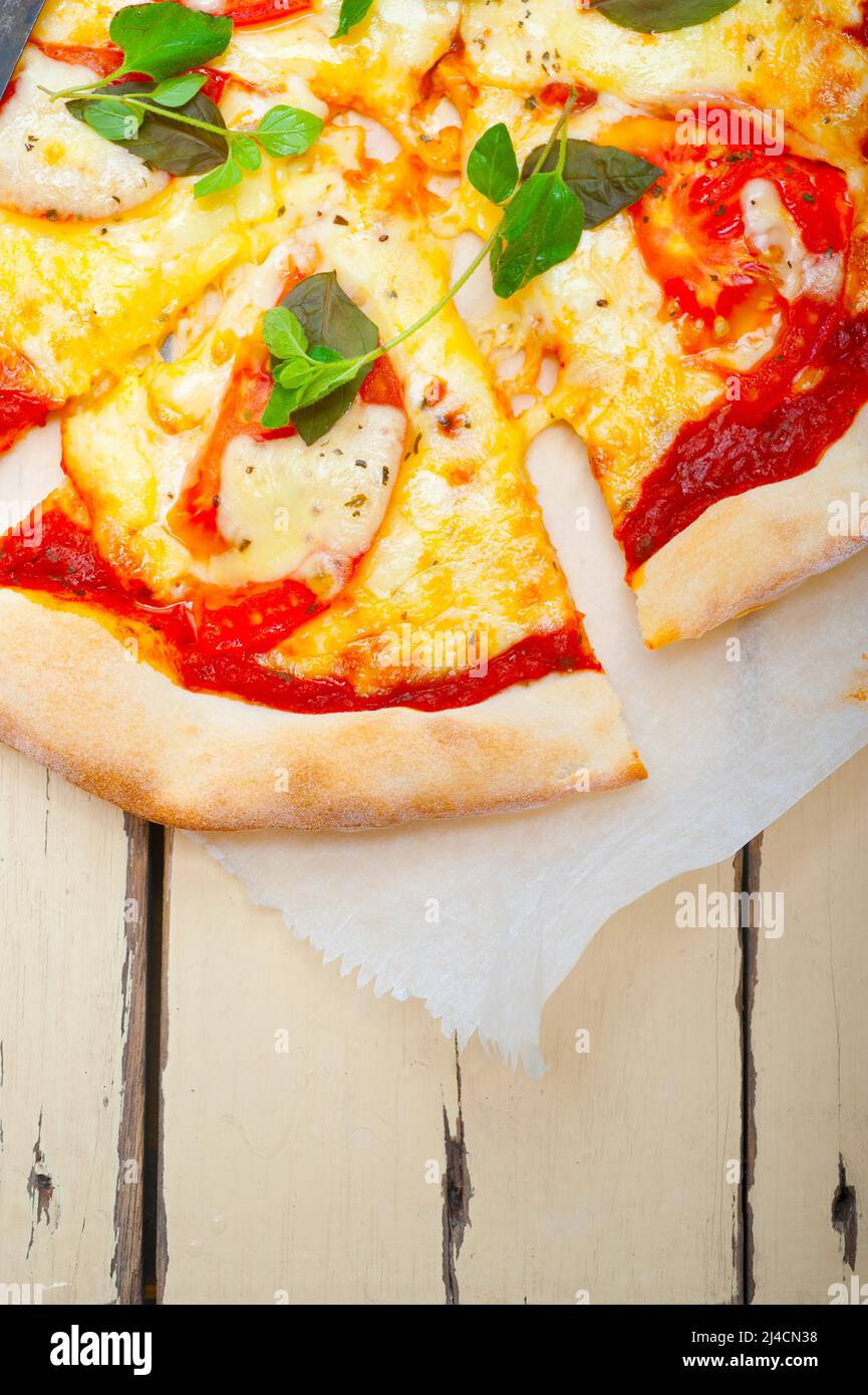 Italian traditional pizza Margherita tomato mozzarella and basil Stock Photo - Alamy
