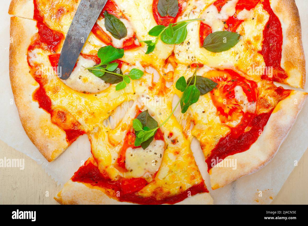 Italian traditional pizza Margherita tomato mozzarella and basil Stock Photo - Alamy