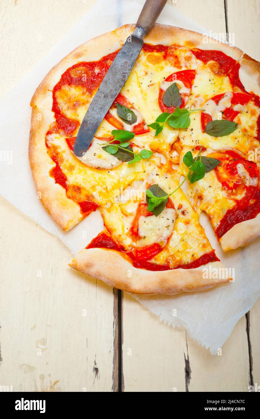 Italian traditional pizza Margherita tomato mozzarella and basil Stock Photo - Alamy