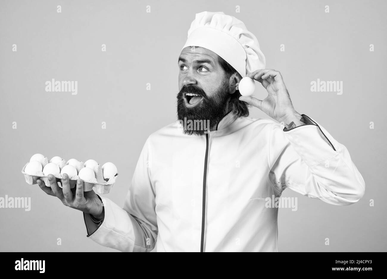 for the healthy you. male chef in hat prepare healthy meal. handsome ...