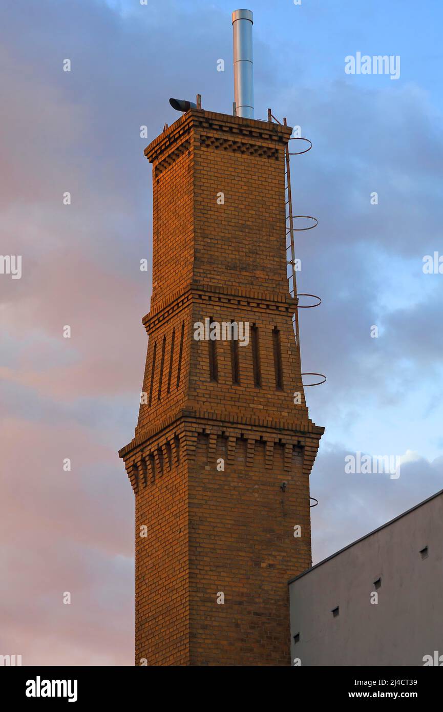 Old brick factory chimney in the evening light, Goerlitz, Upper Lusatia ...
