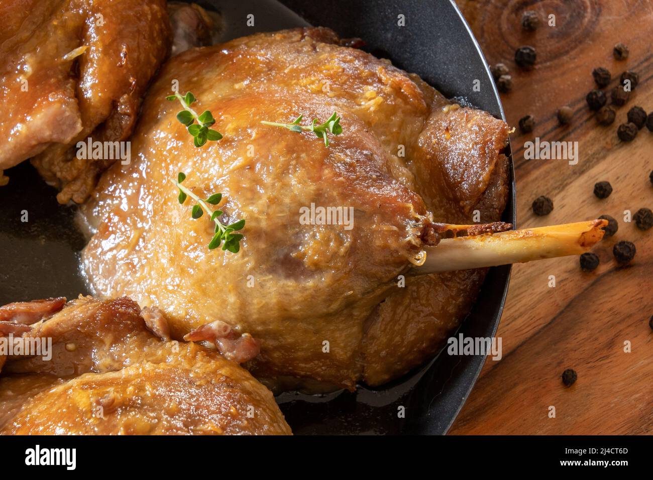 duck confit cooked in a dish Stock Photo - Alamy