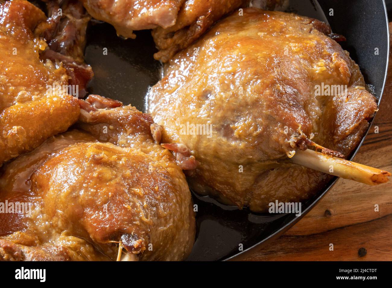 duck confit cooked in a dish Stock Photo - Alamy