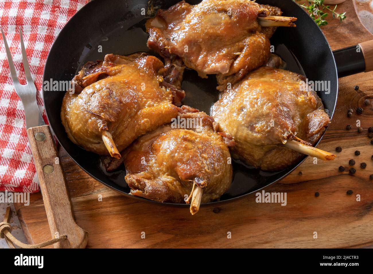 duck confit cooked in a dish Stock Photo - Alamy