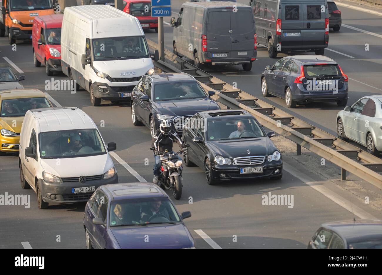 Motorbike column jumping weaving through overtaking, slow-moving ...