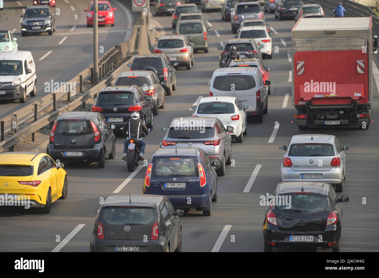 Motorbike column jumping weaving through overtaking, slow-moving ...
