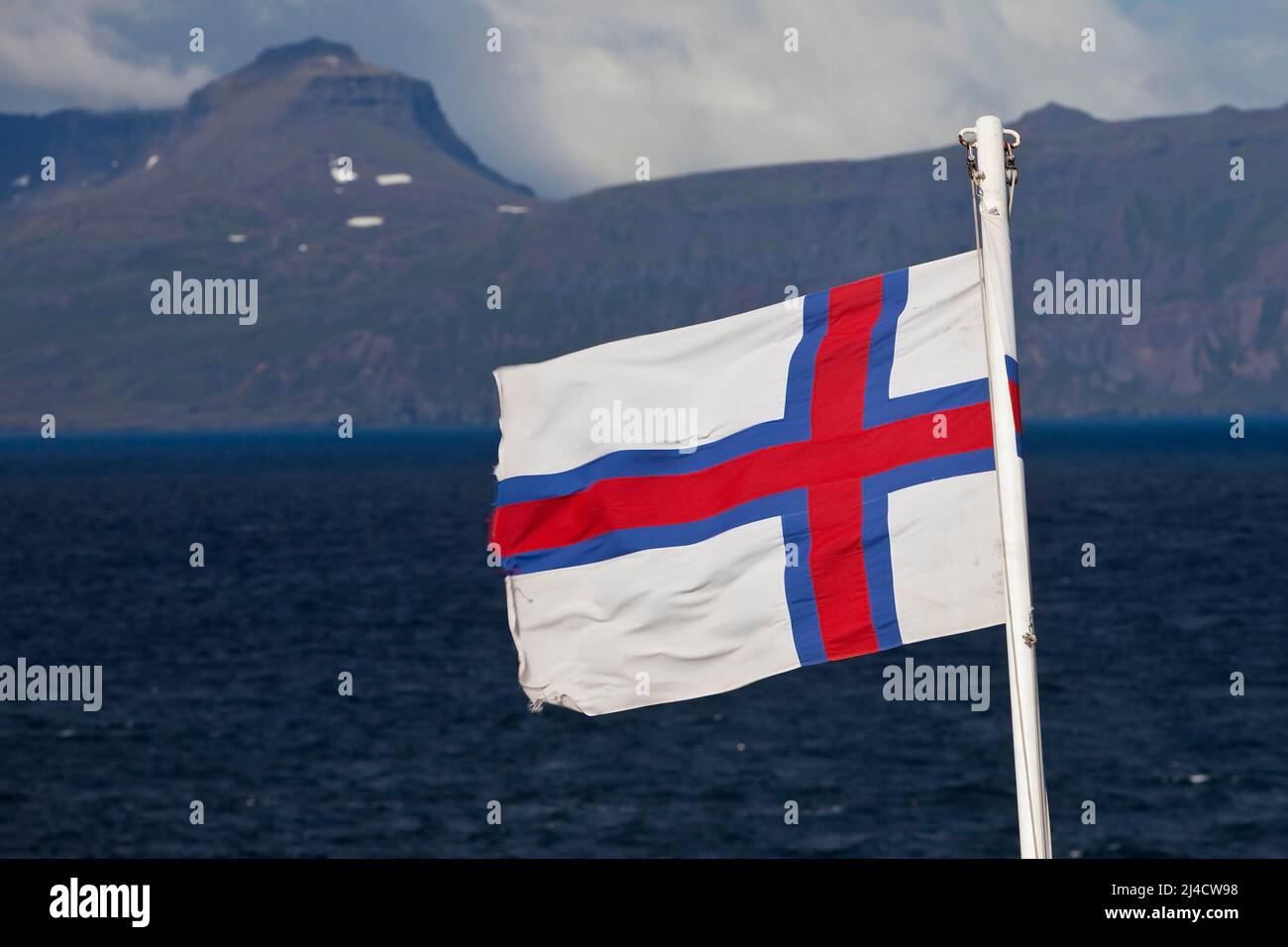 Flag of the Faroe Islands in front of the North Atlantic Ocean Stock ...