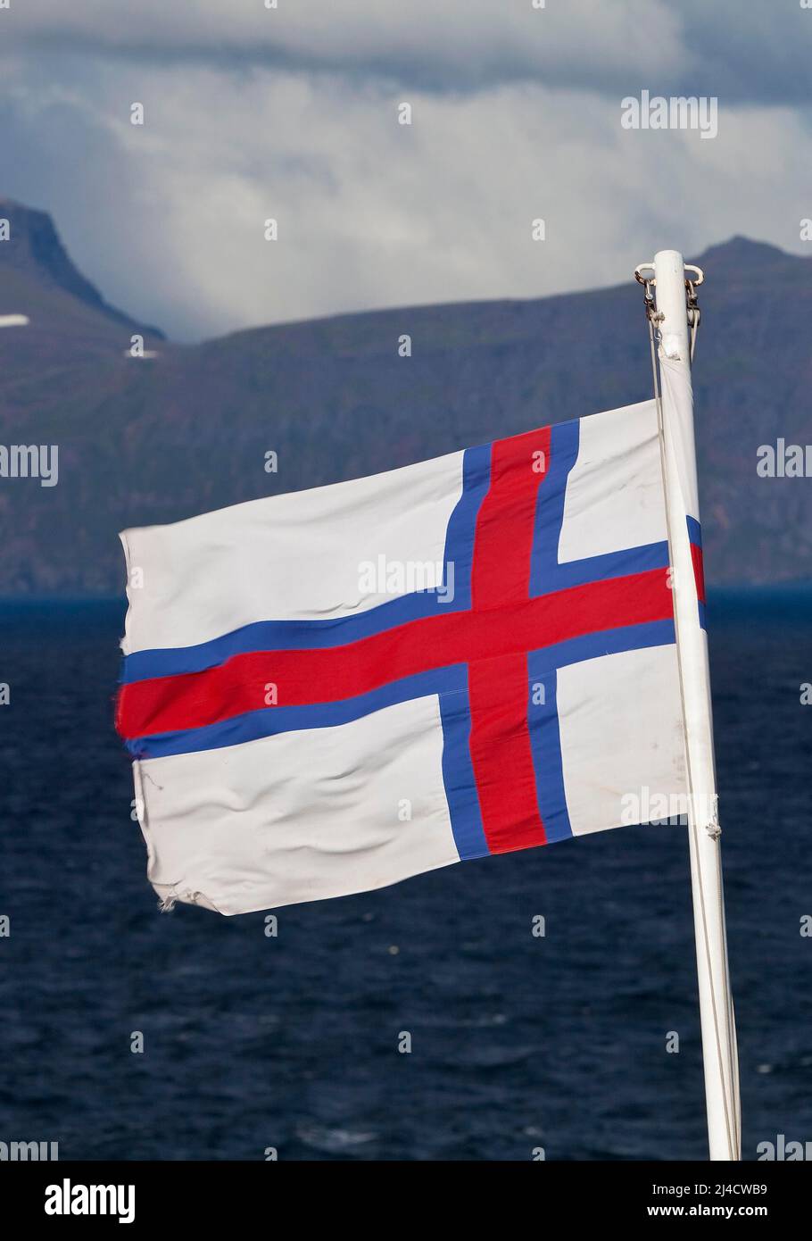 Flag of the Faroe Islands in front of the North Atlantic Ocean Stock ...
