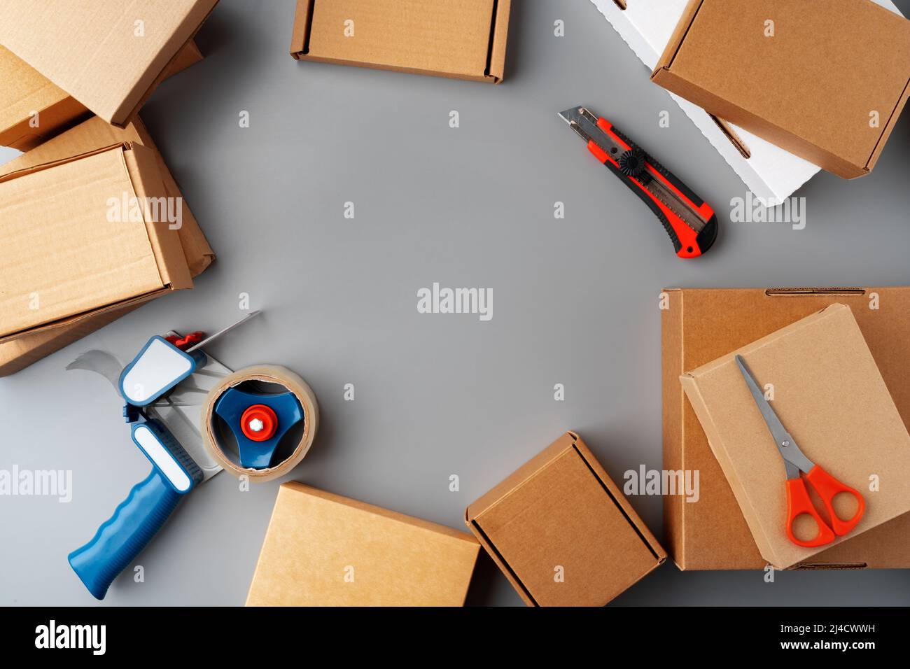 Above table top view of warehouse preparing post courier delivery ...