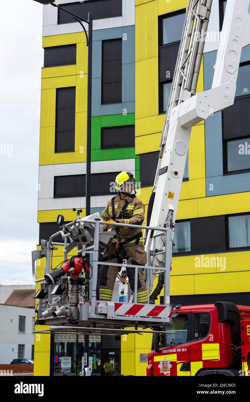 Firefighter operating the lift cradle on Essex County Fire & Rescue ...
