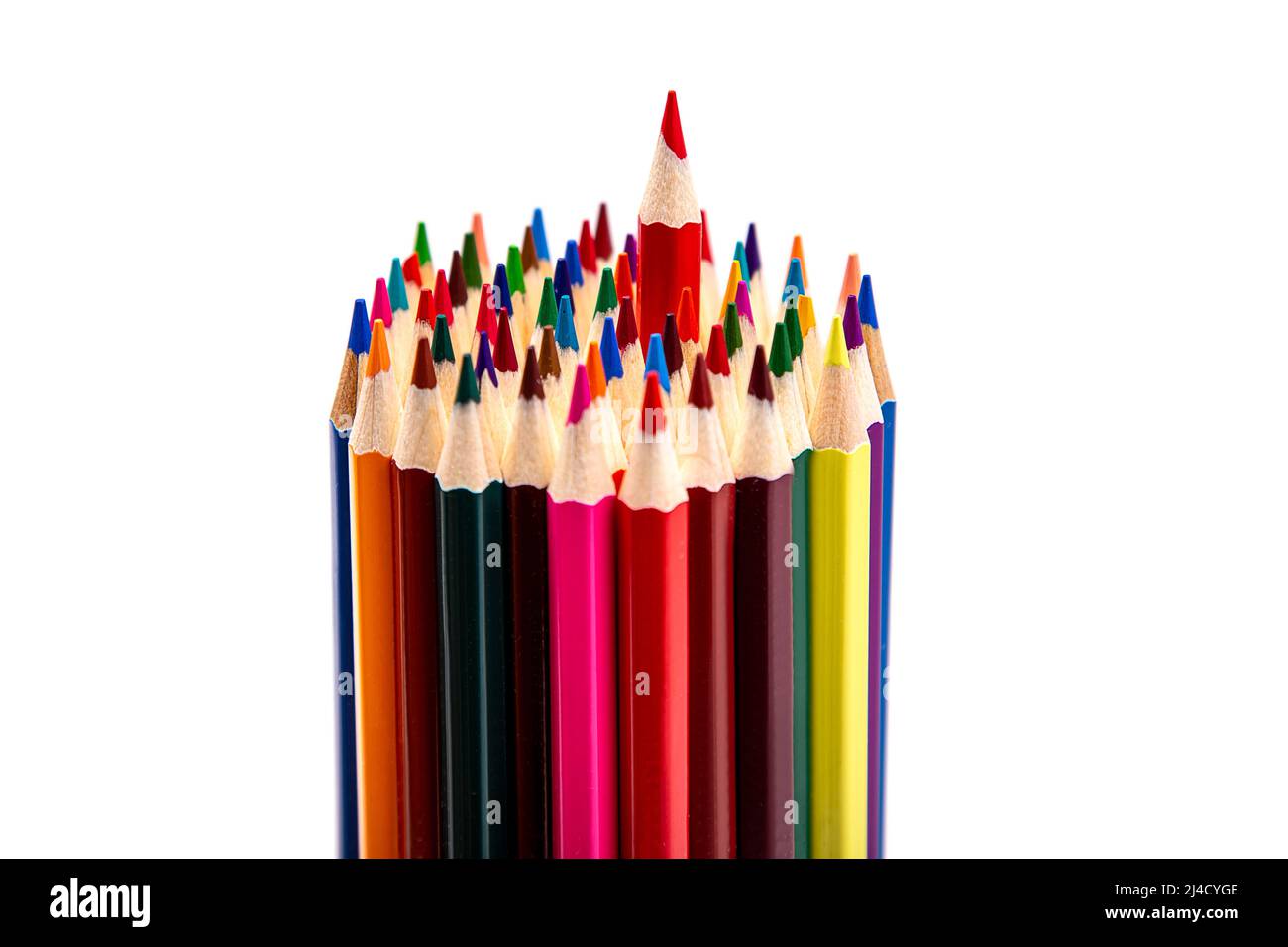 A set of colored pencils standing vertically isolated on a white ...