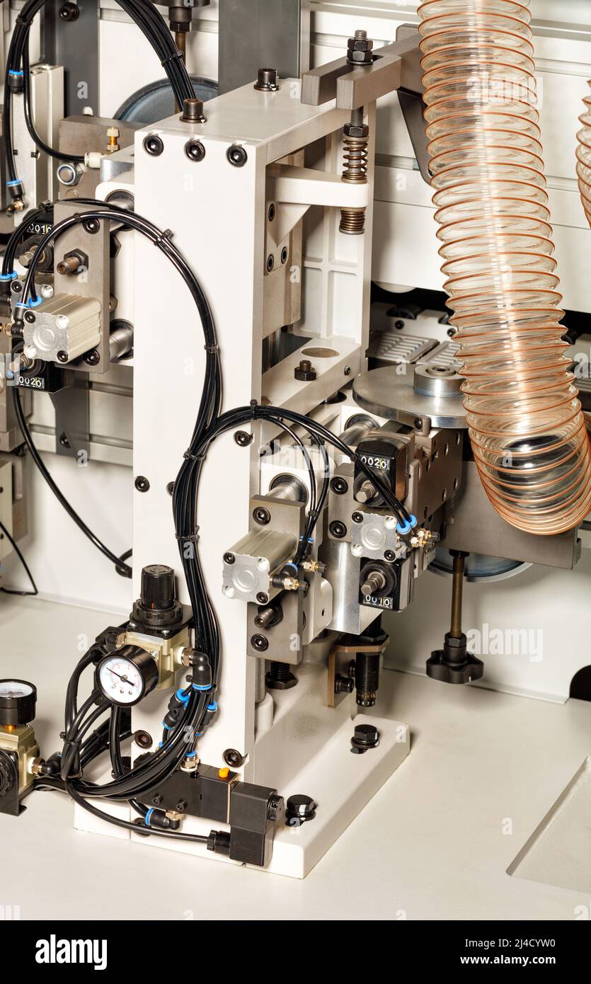 A fragment of a pneumatic electronic unit of a woodworking machine with ...