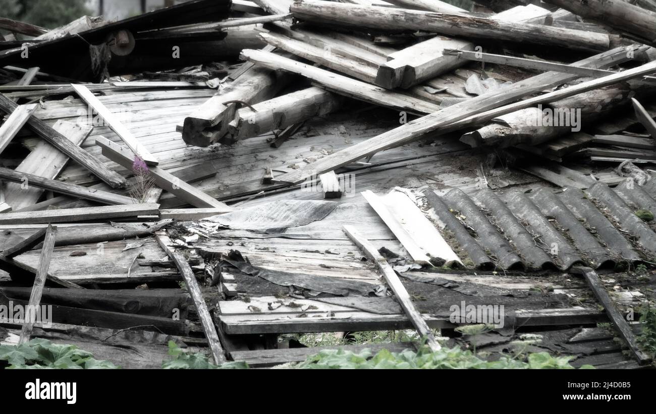 The remains of a wooden house, a complete ruin Stock Photo - Alamy