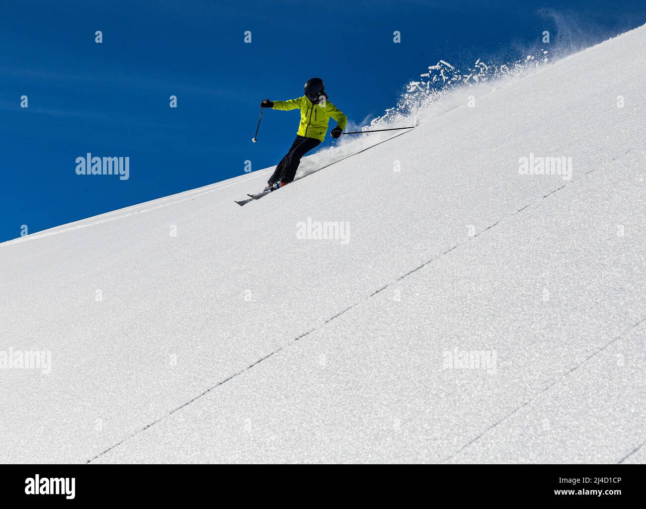 Young kid cruising down a powdery slope Stock Photo - Alamy