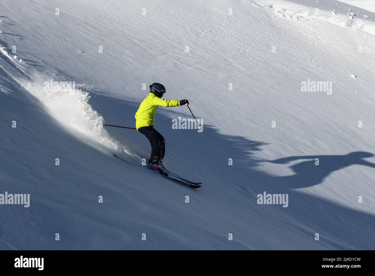 Young kid cruising down a powdery slope Stock Photo - Alamy