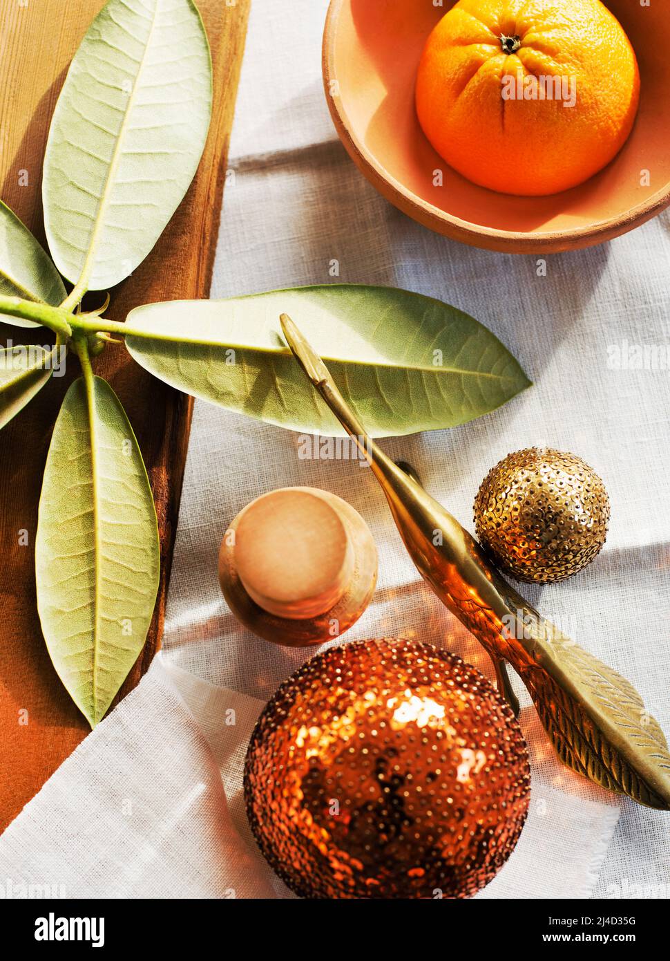 Still life with an orange Stock Photo - Alamy