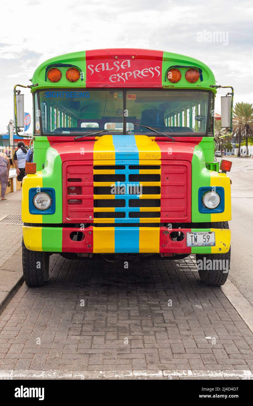Colorfully painted former school bus used for sightseeing tours at ...