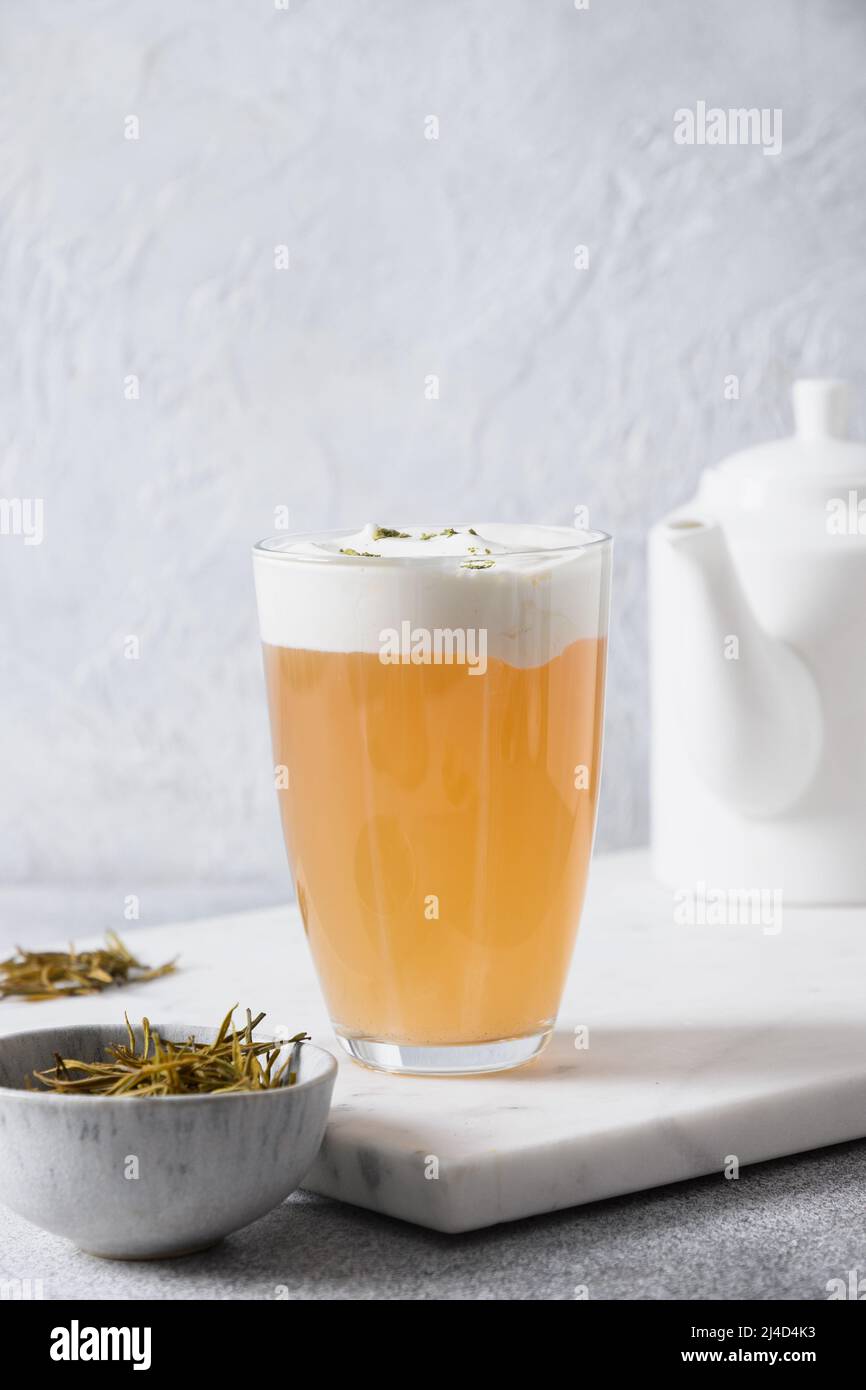 Chinese cheese tea with whipped cheese and cream on light gray ...