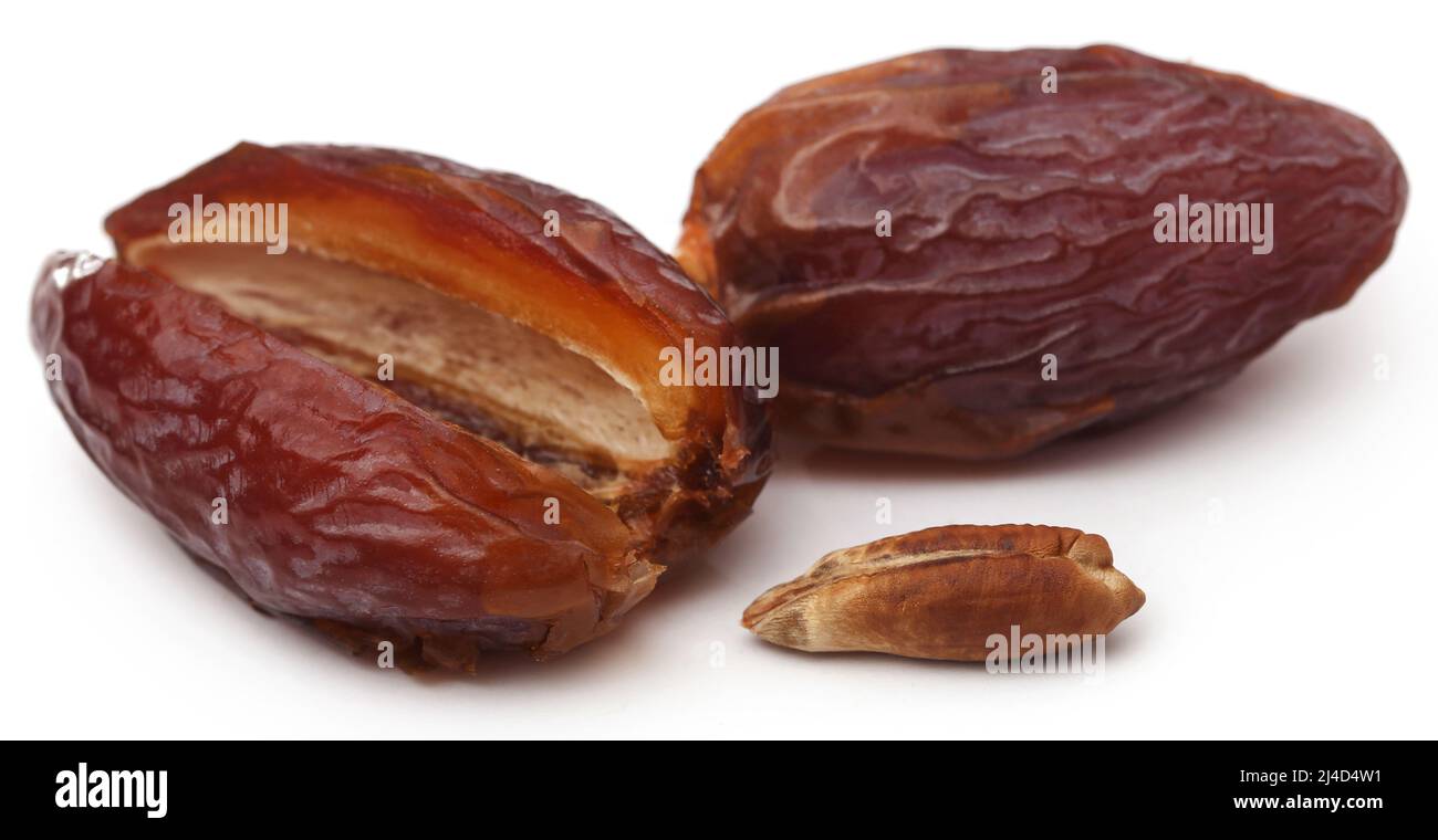 Fresh Arabian dates over white background Stock Photo - Alamy