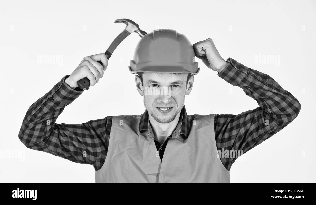 professional repairman in helmet. build and construction. skilled ...