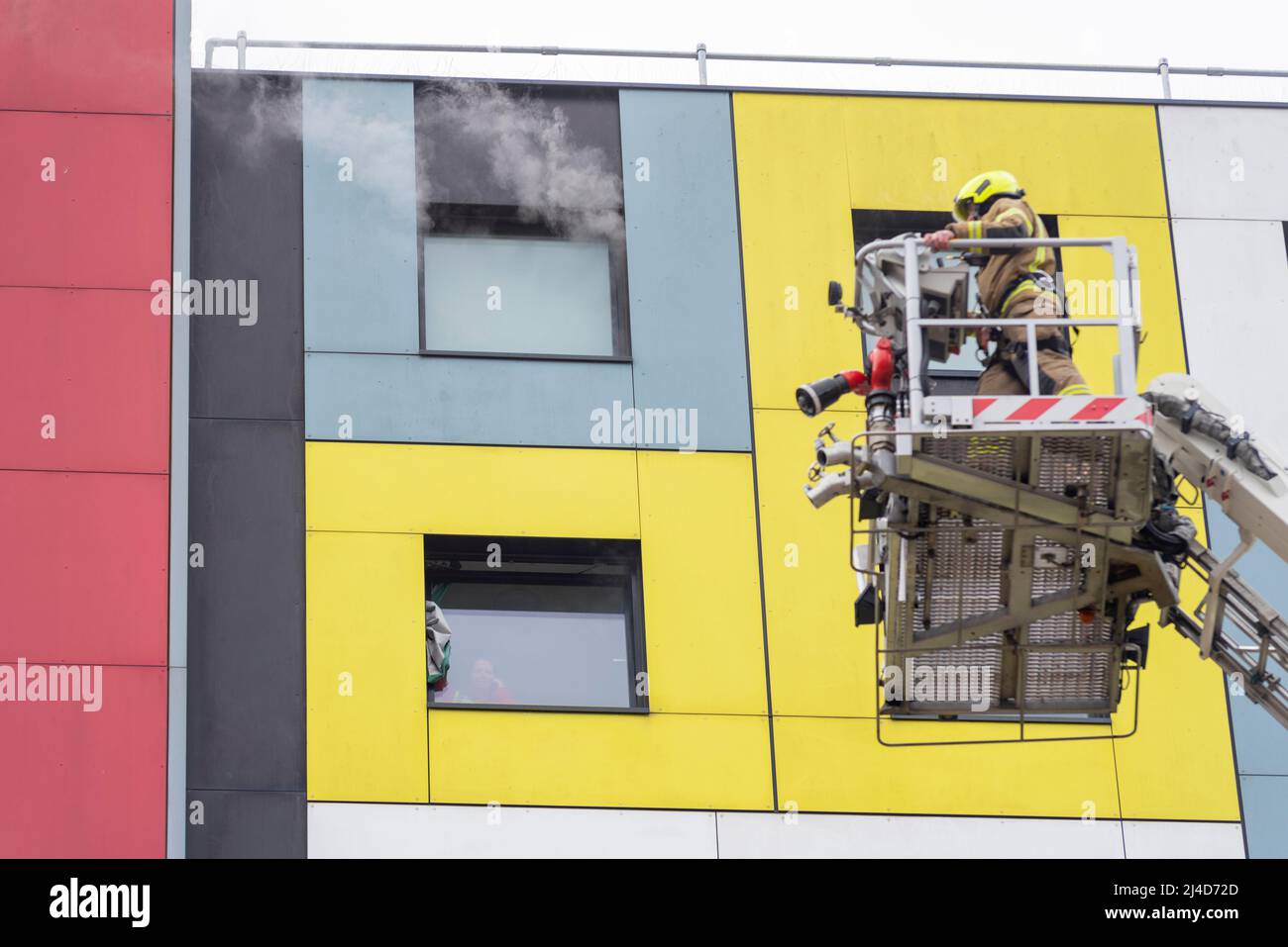 Firefighter in lift cage of Essex County Fire & Rescue Service Angloco ...