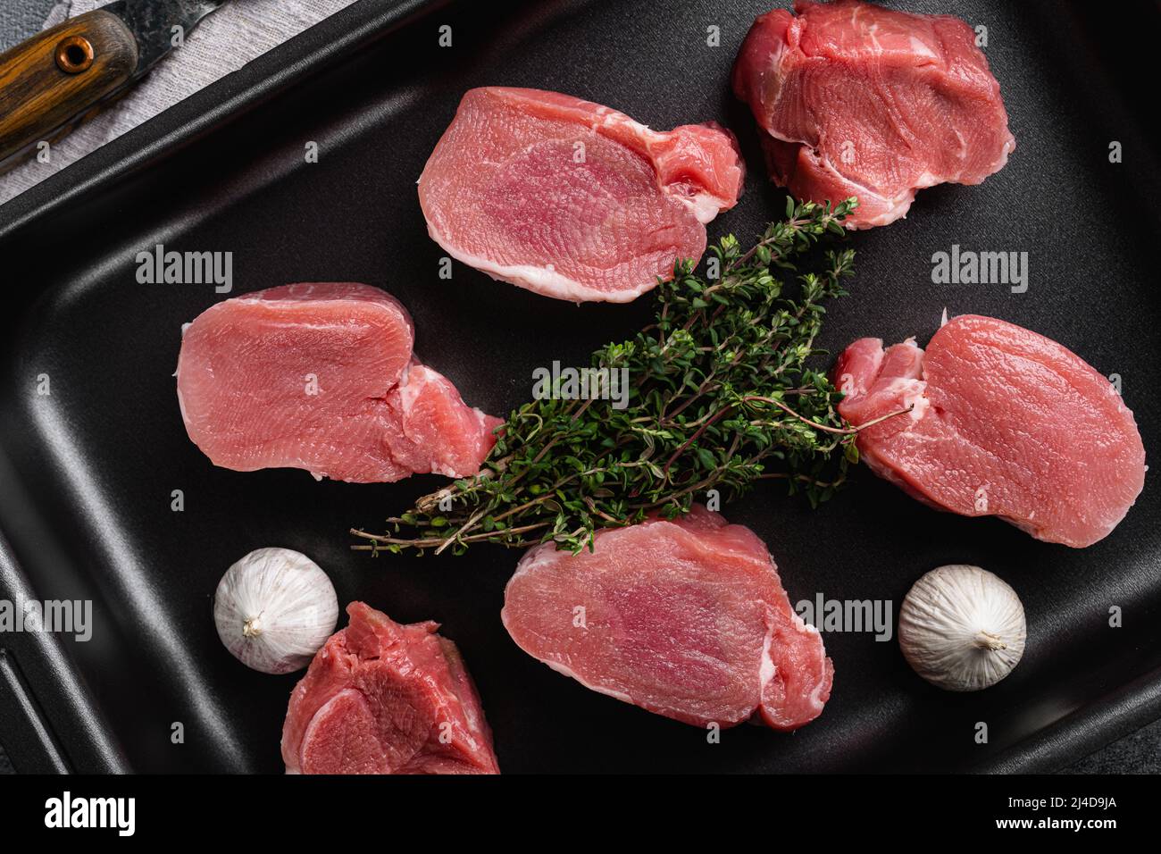 Organic pork meat chops set, on gray stone table background, top view ...