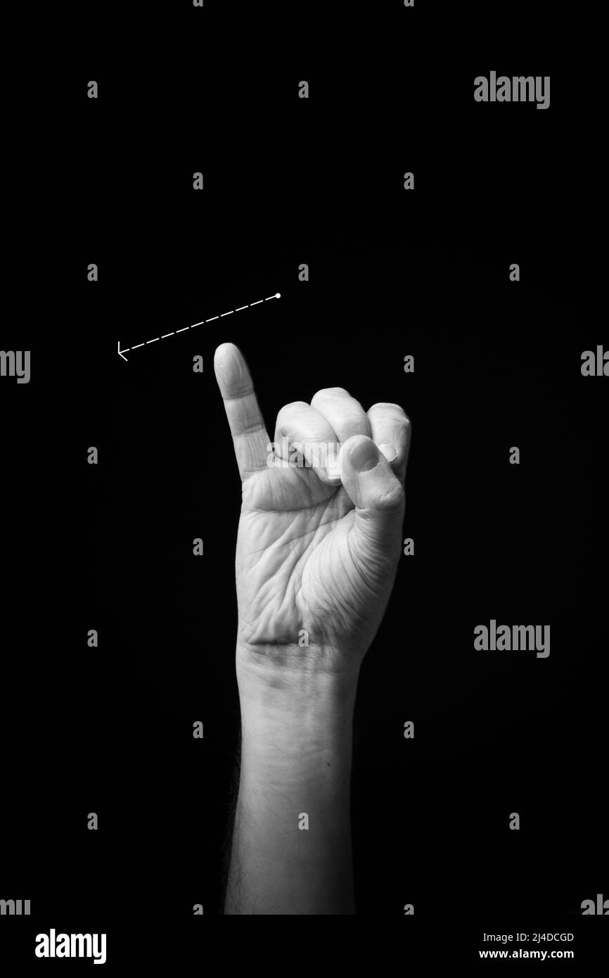 Dramatic black and white image of a male hand fingerspelling the ...