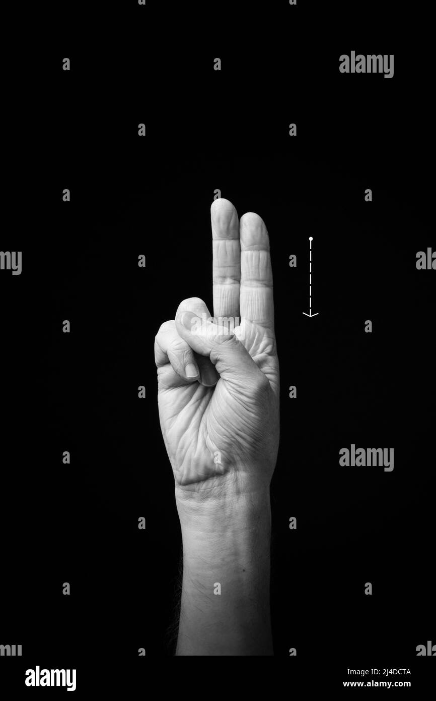 Dramatic black and white image of a male hand fingerspelling the ...