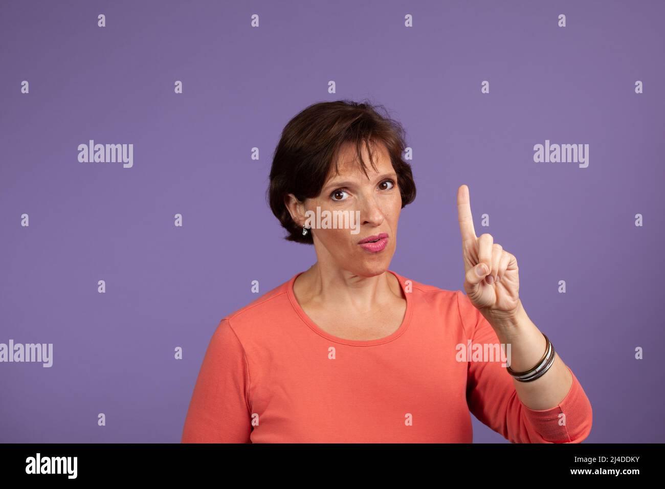 Holding up one finger hi-res stock photography and images - Alamy