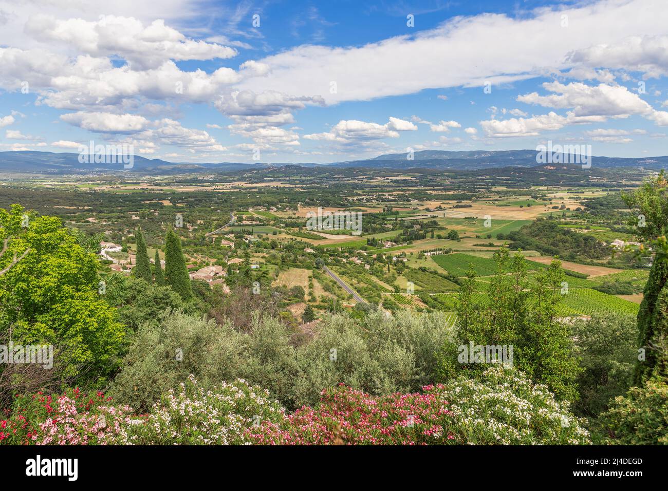 Breathtaking view of Luberon valley under blue sky with white clouds ...
