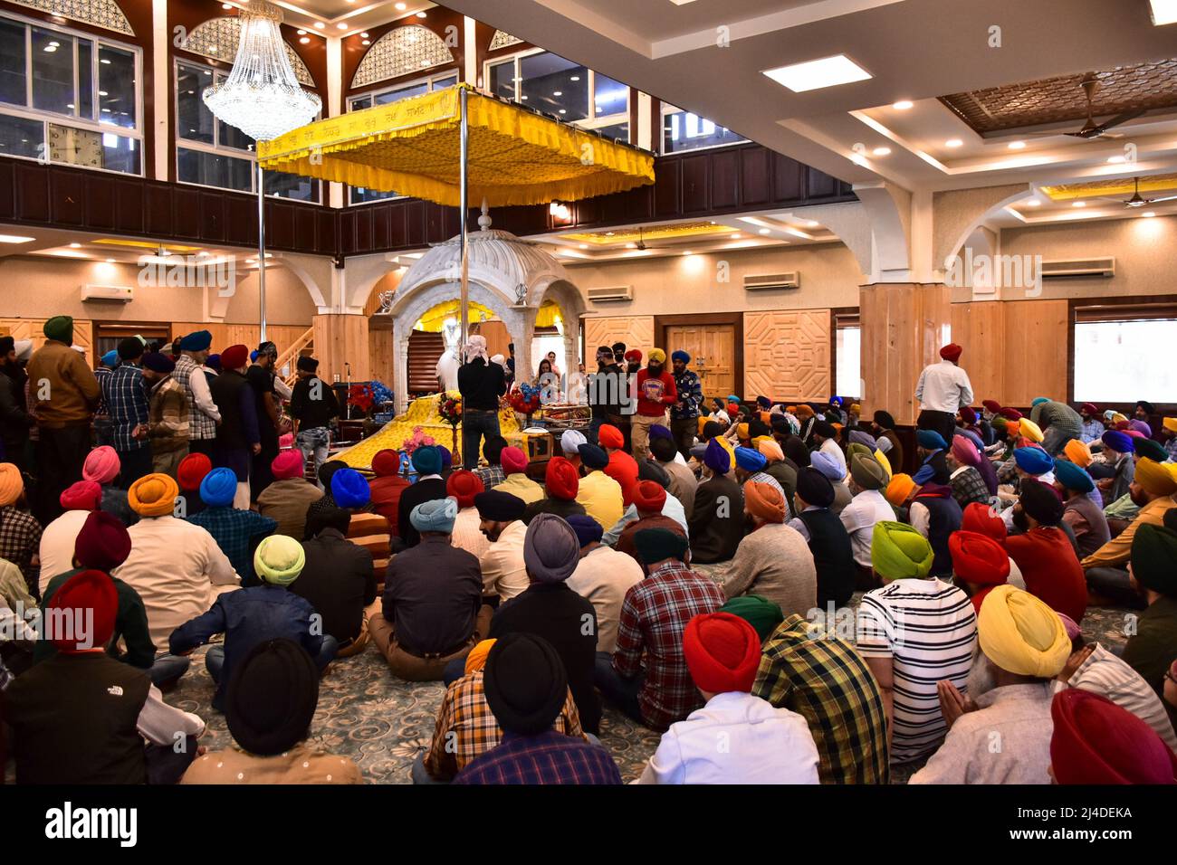Sikh devotees attend rituals inside a Gurdwara or a Sikh temple on the ...