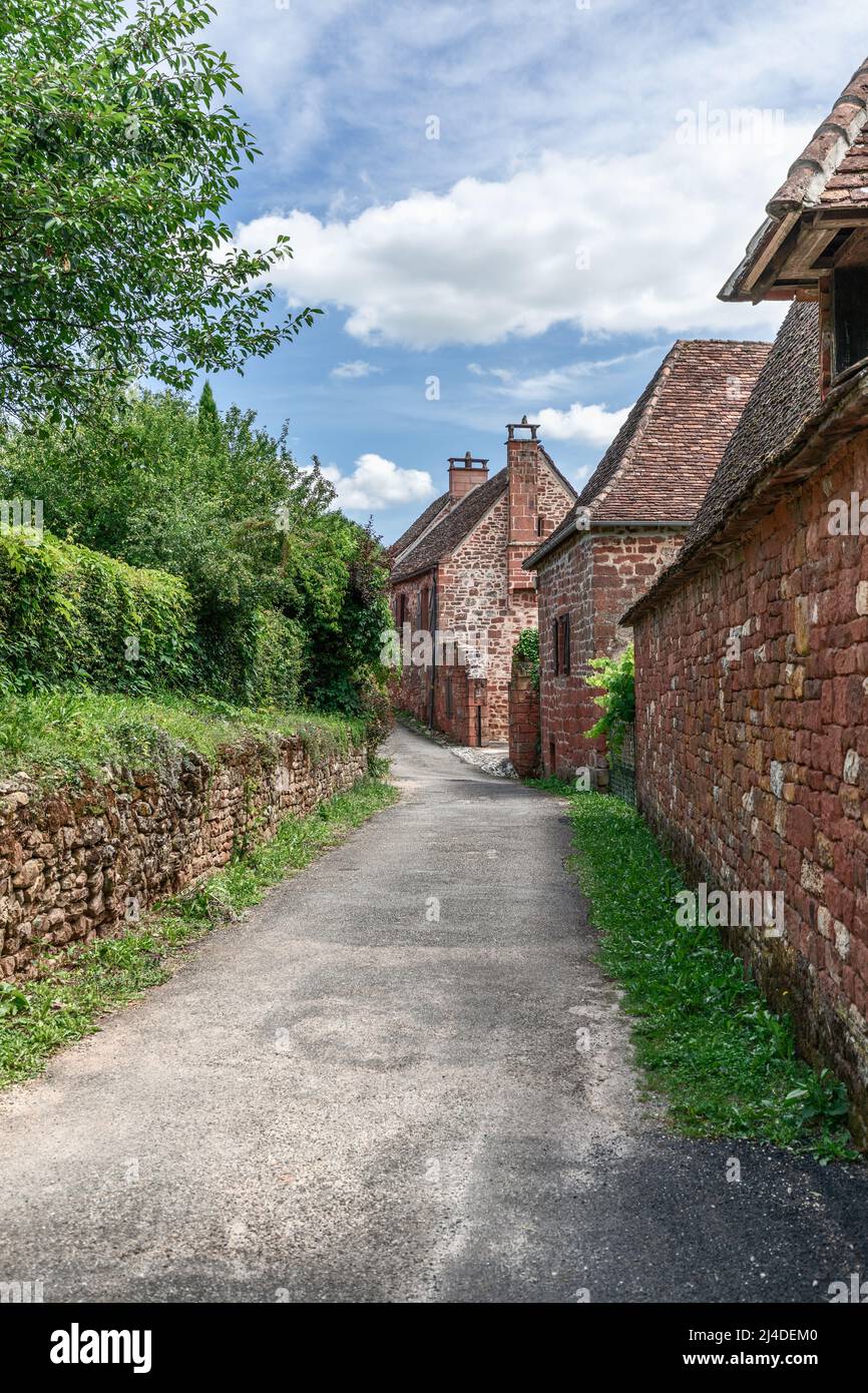 Street with perfectly preserved medieval residential masonry buildings ...