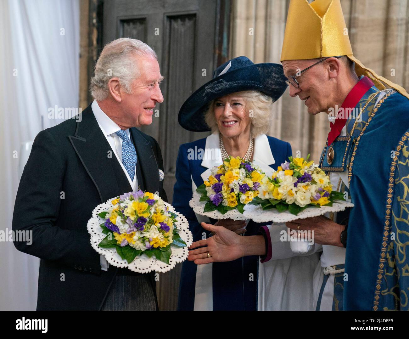 The Prince of Wales and the Duchess of Cornwall are greeted by the Dean ...