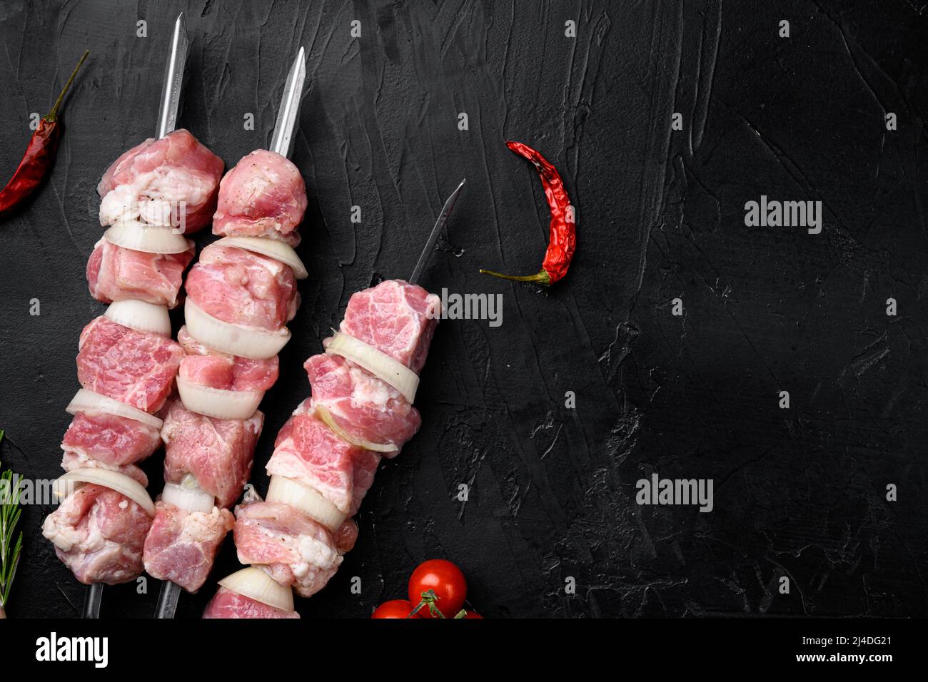 Raw kebab set, top view flat lay, with copy space for text, on black ...