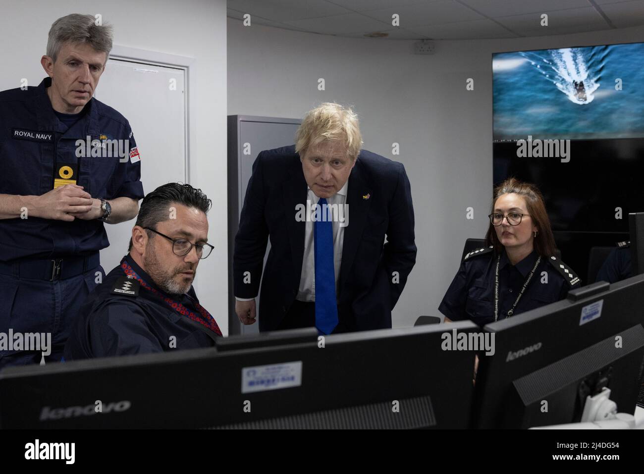 Prime Minister Boris Johnson (second right) visits the command room at ...