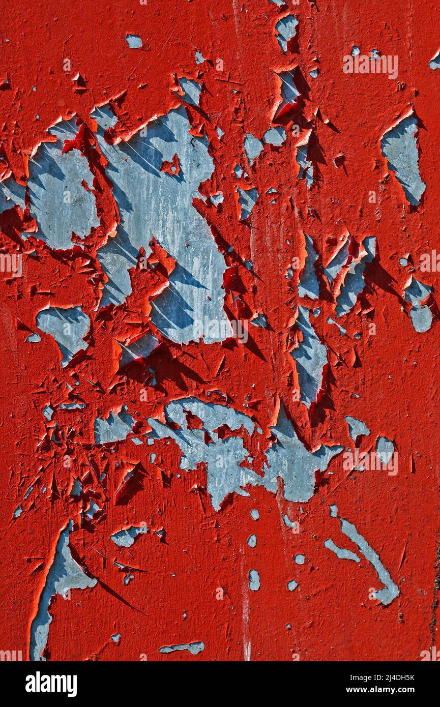 Damaged red metallic surface with peeling paint Stock Photo - Alamy