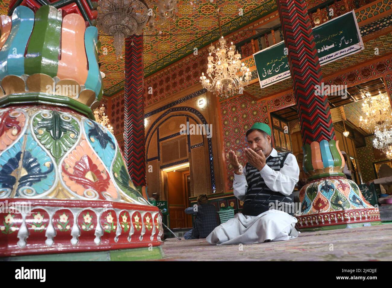 Srinagar, India. 12th Apr, 2022. A Muslim devotees pray during the holy ...