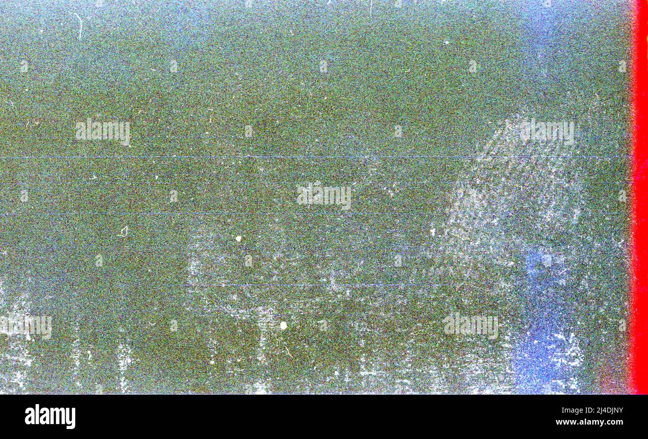 Blank grained toned film strip texture background with heavy grain ...