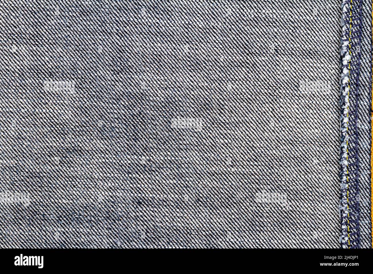 Back side of jeans fabric with back seam Stock Photo - Alamy