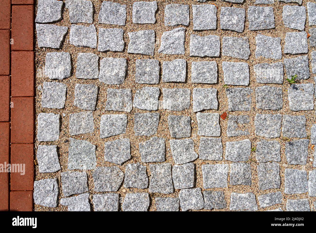 Gray granite blocks in the walkway Stock Photo - Alamy