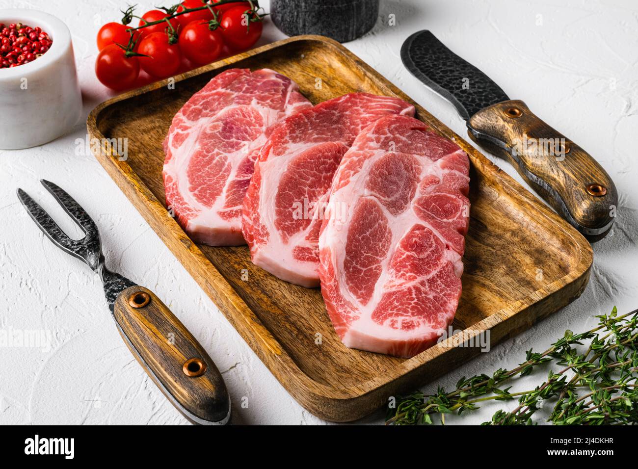 Fresh raw pork neck meat, on white stone table background Stock Photo ...
