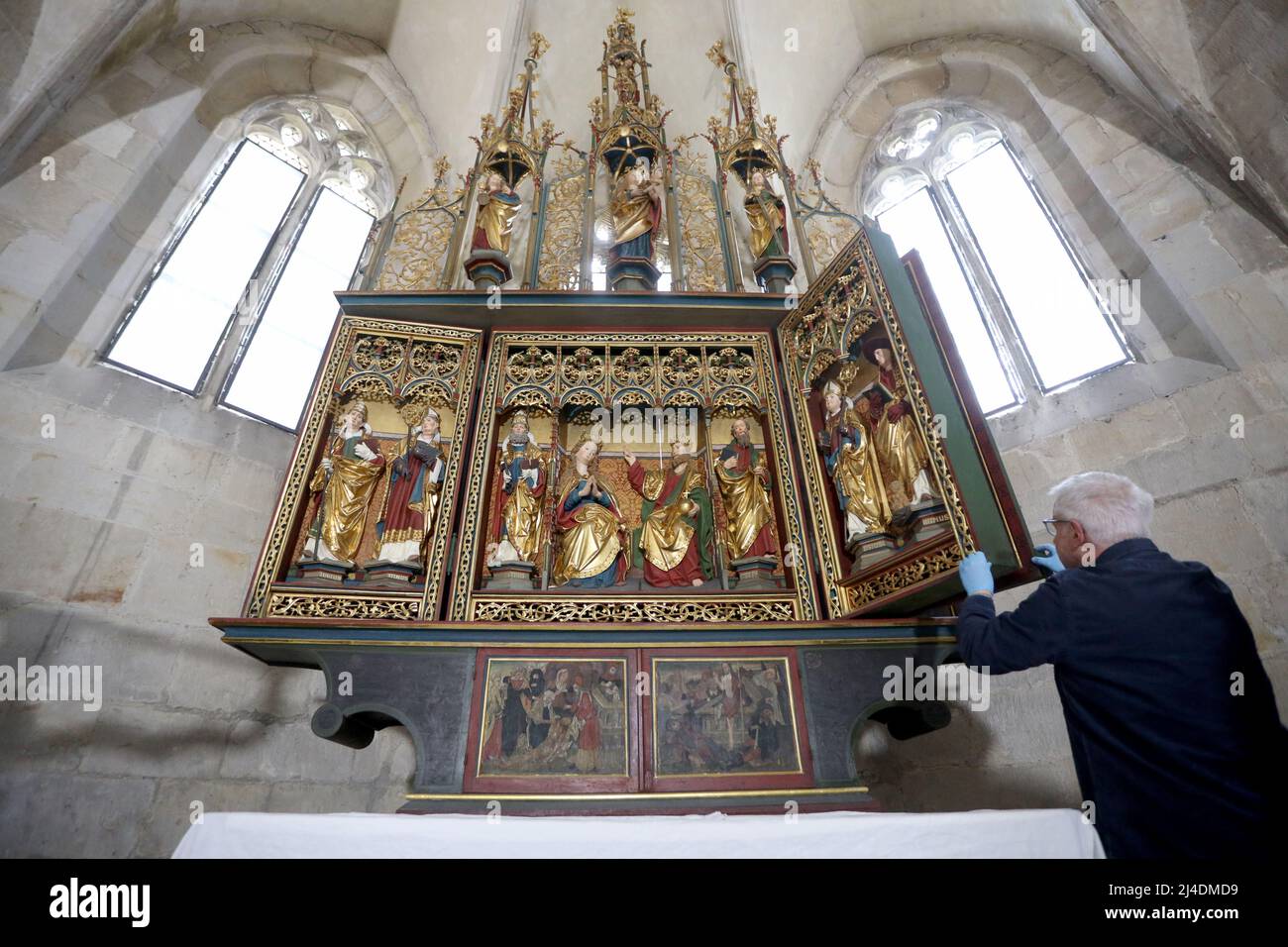 14 April 2022, Saxony-Anhalt, Halberstadt: Hartmut Meier, restorer on ...