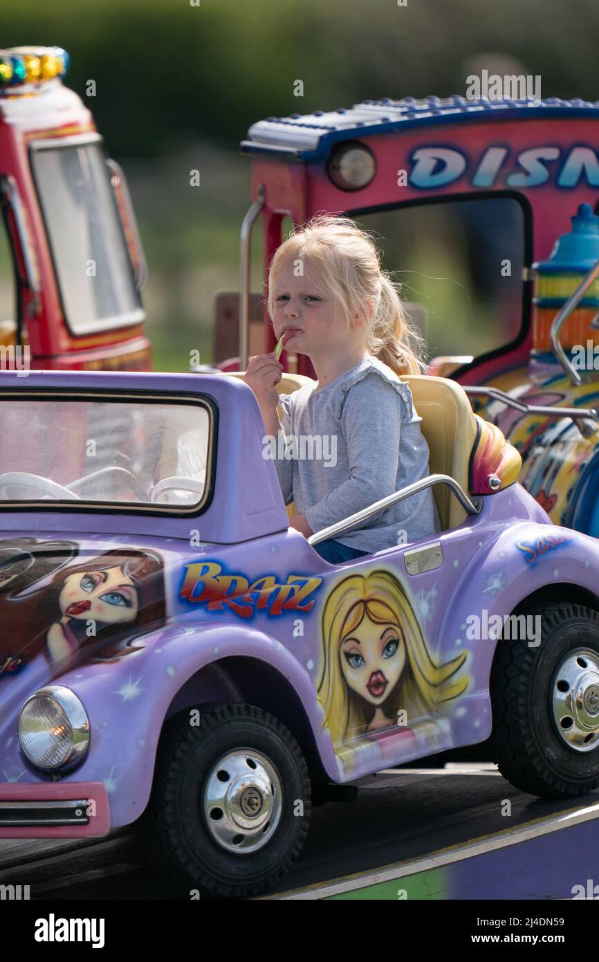 Zara Tindall's daughter Lena Elizabeth eating sweets on the funfair at ...