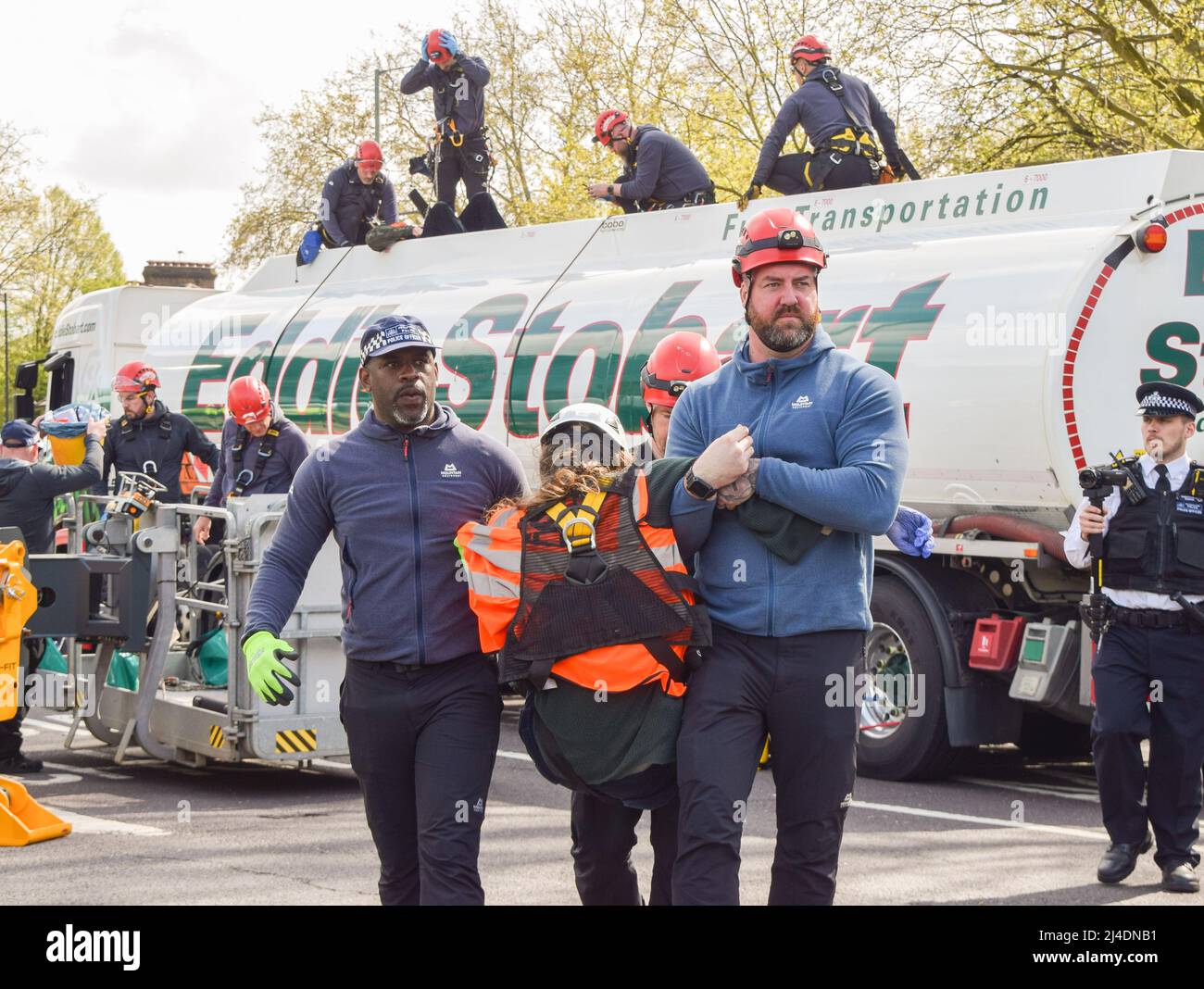 London, UK, 14th April 2022. Police officers remove and arrest a ...