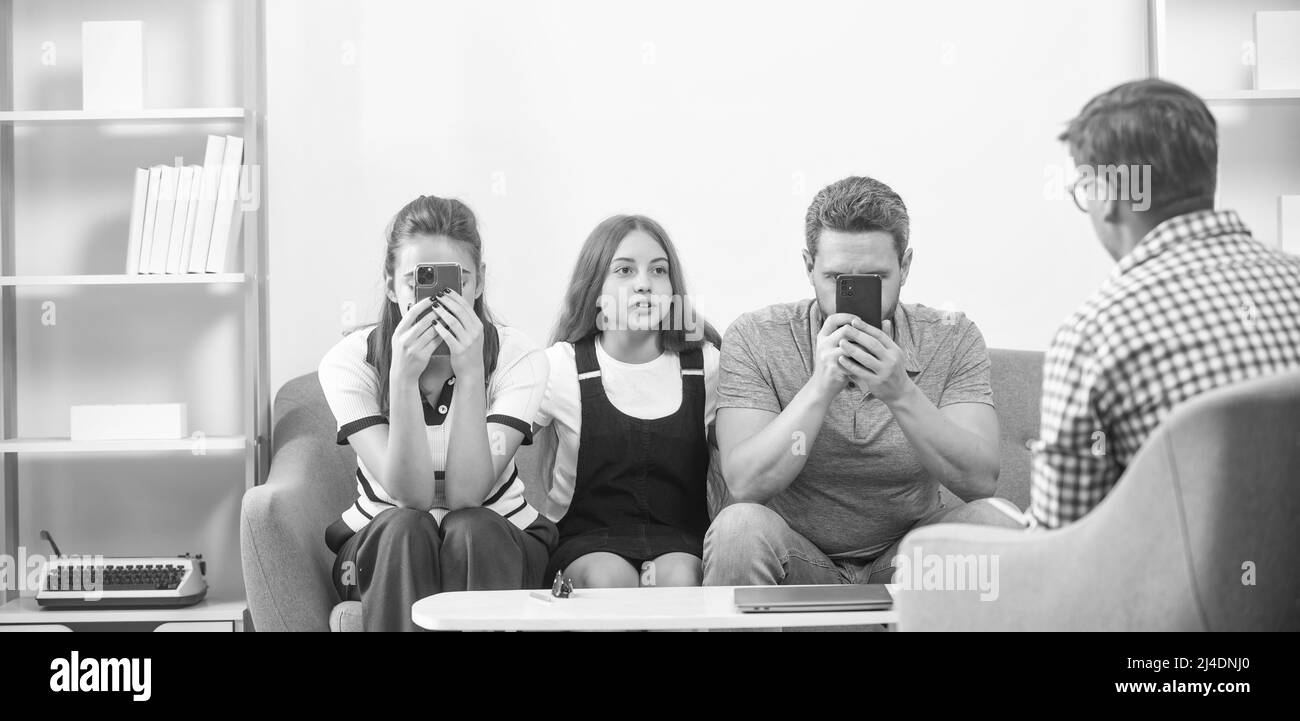 phone addicted father mother and child at family psychologist ...