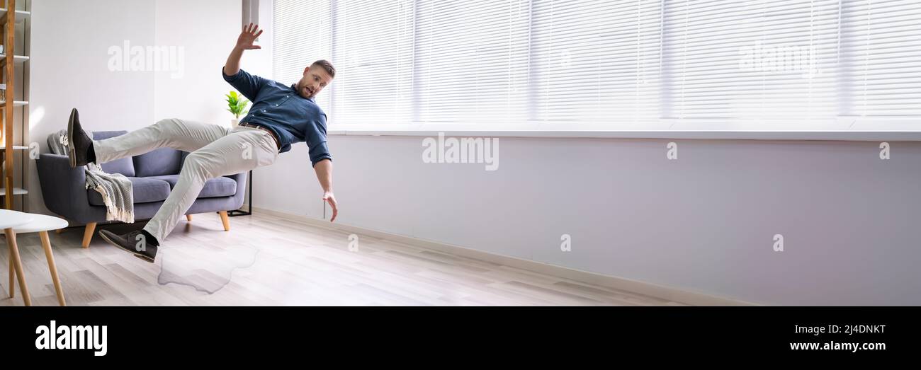 Clumsy Man Slip And Fall Accident. Injury Compensation Stock Photo - Alamy