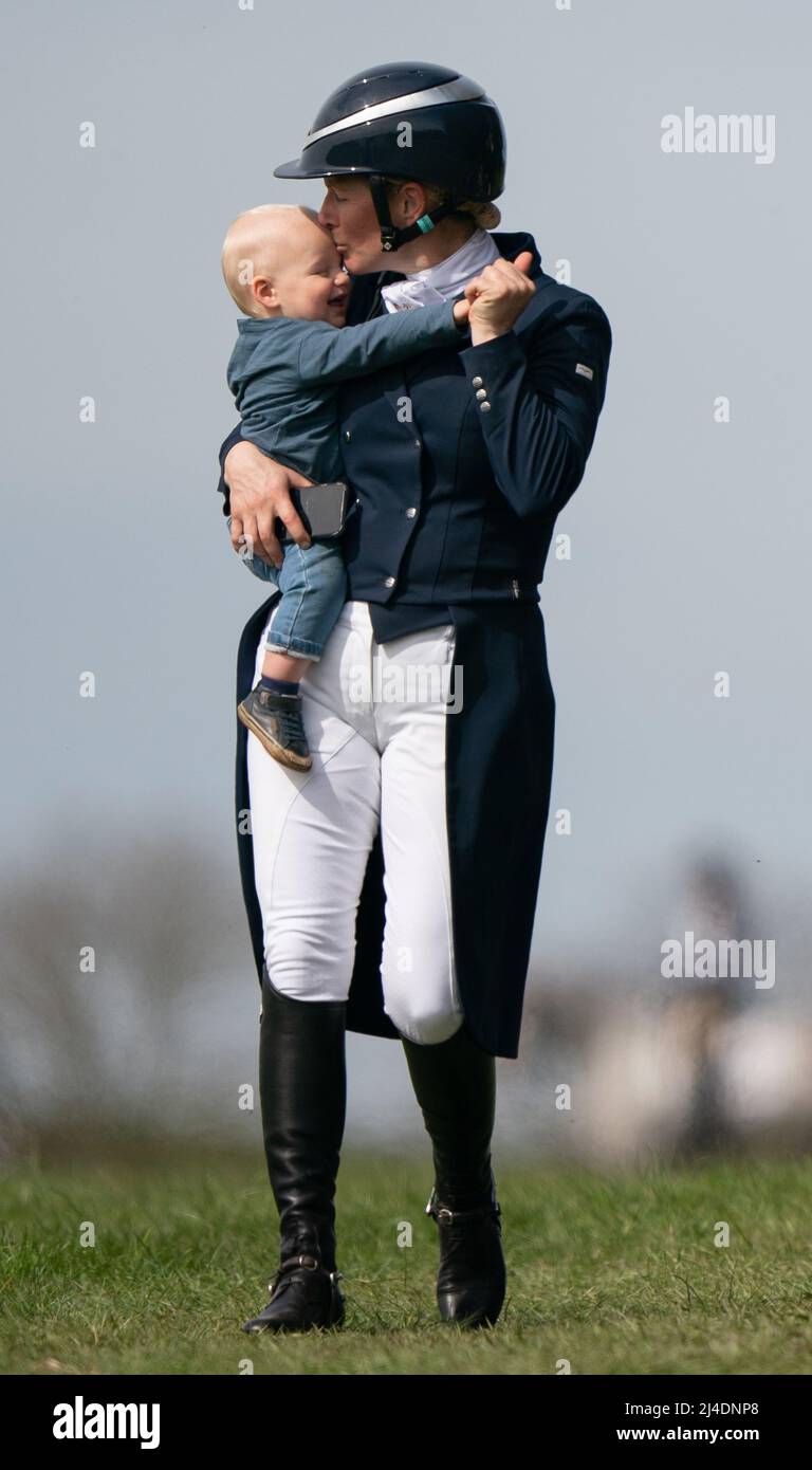 Zara Tindall kisses her son Lucas after competing at the Barefoot ...