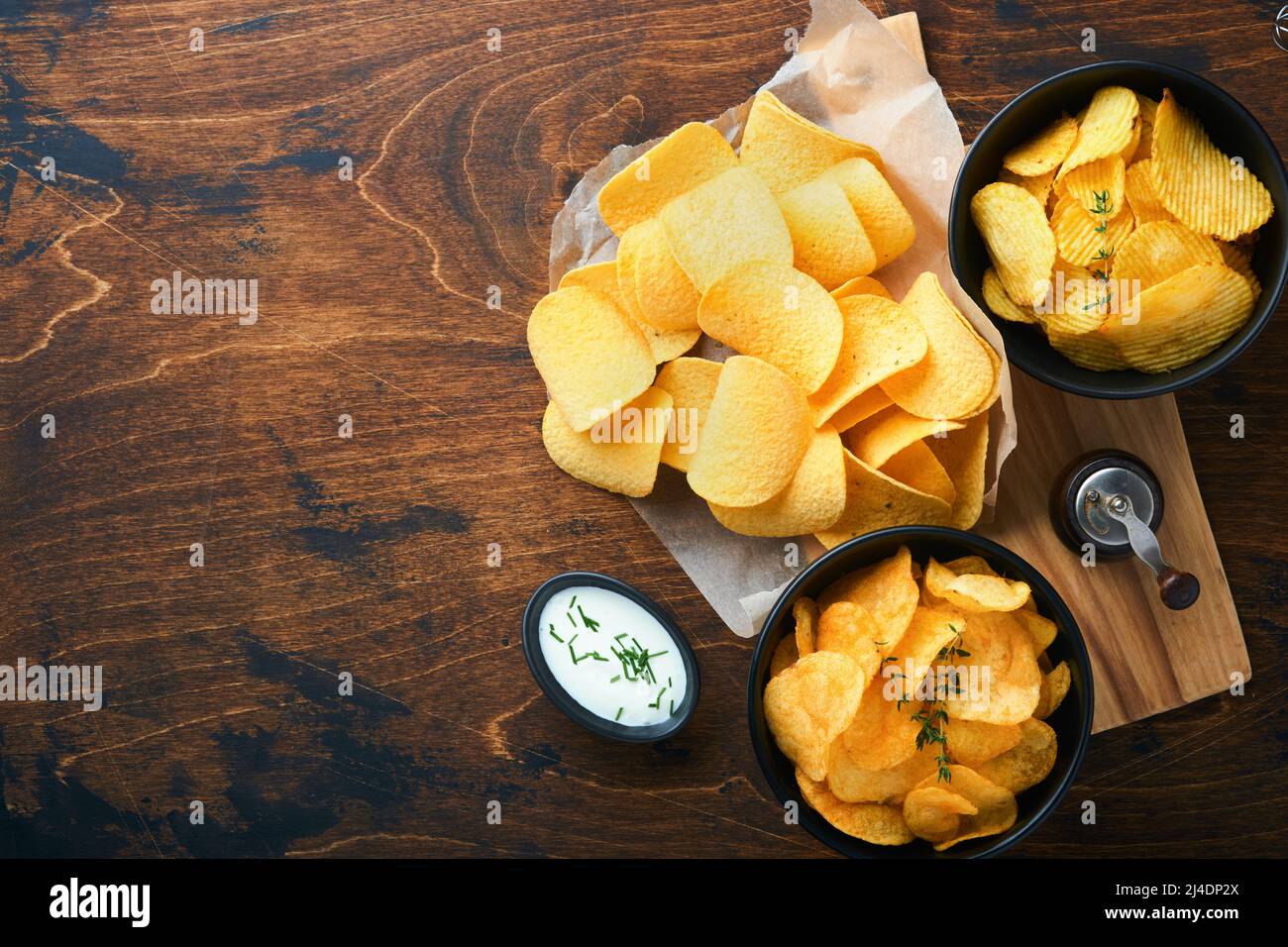 Potato corrugatedchips. Fast food. Crispy potato chips ceramic black ...