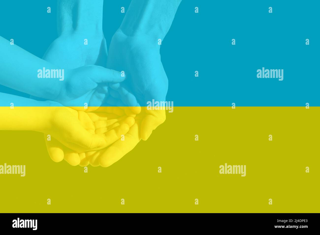 Pray for Ukraine. hand in prayer and the Ukrainian flag in the ...