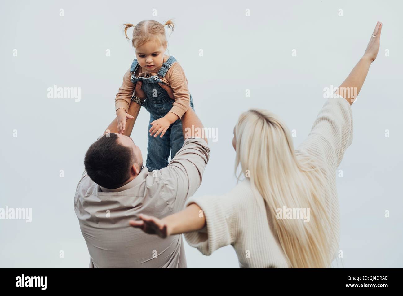 Young Family Having Fun Time Outdoors, Father Holding His Little ...